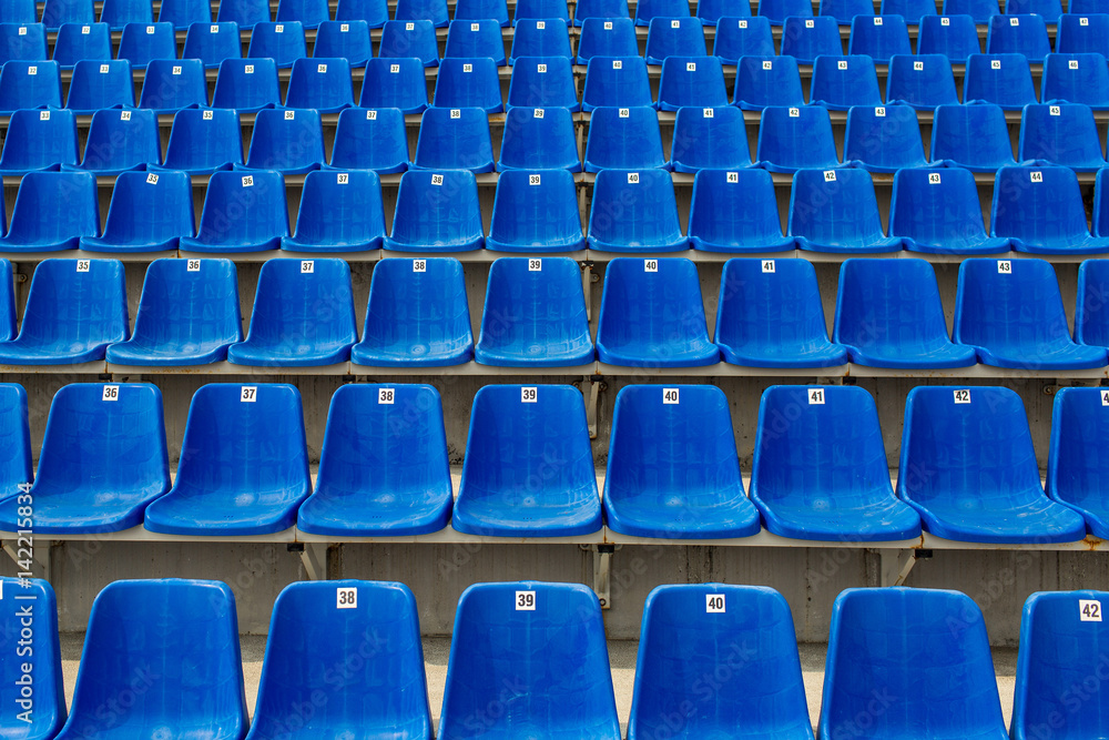 Dark blue rows of seats on the stadium Stock Photo | Adobe Stock