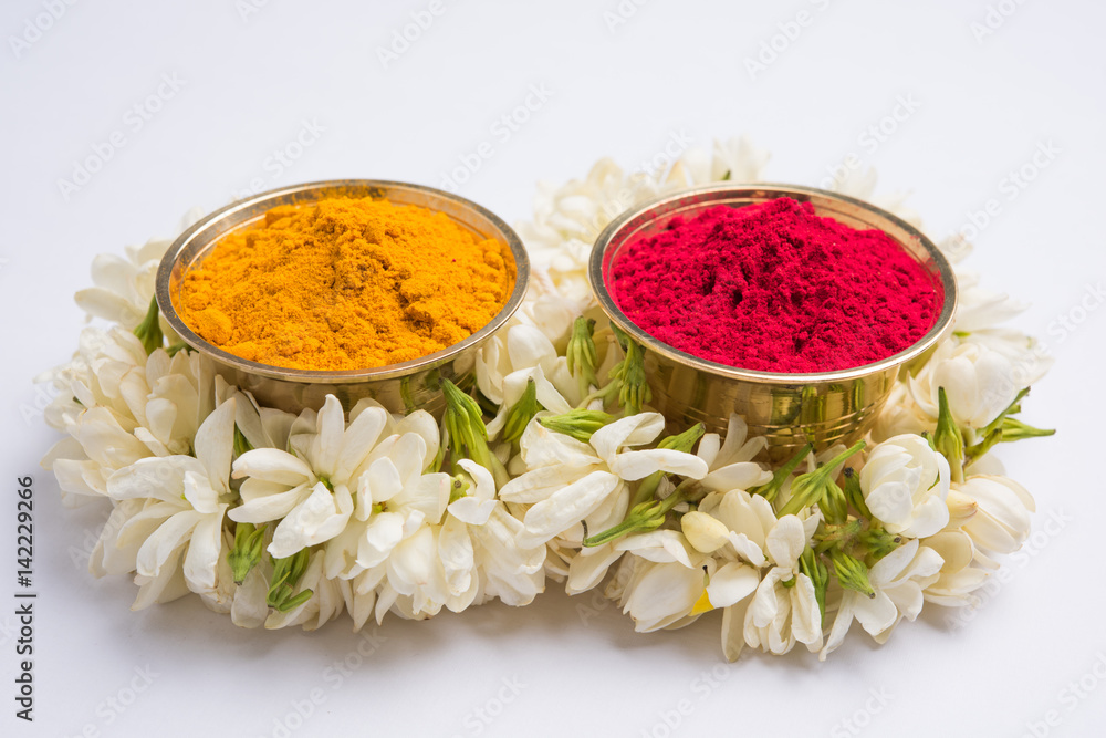 huldi kumkum or haldi-kumkum,indian hindu or punjabi woman applies on ...