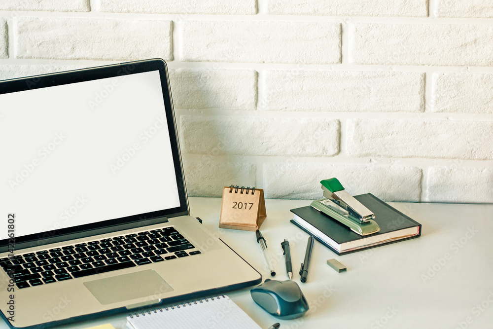 Workspace with laptop notebook stick notes on white background ...