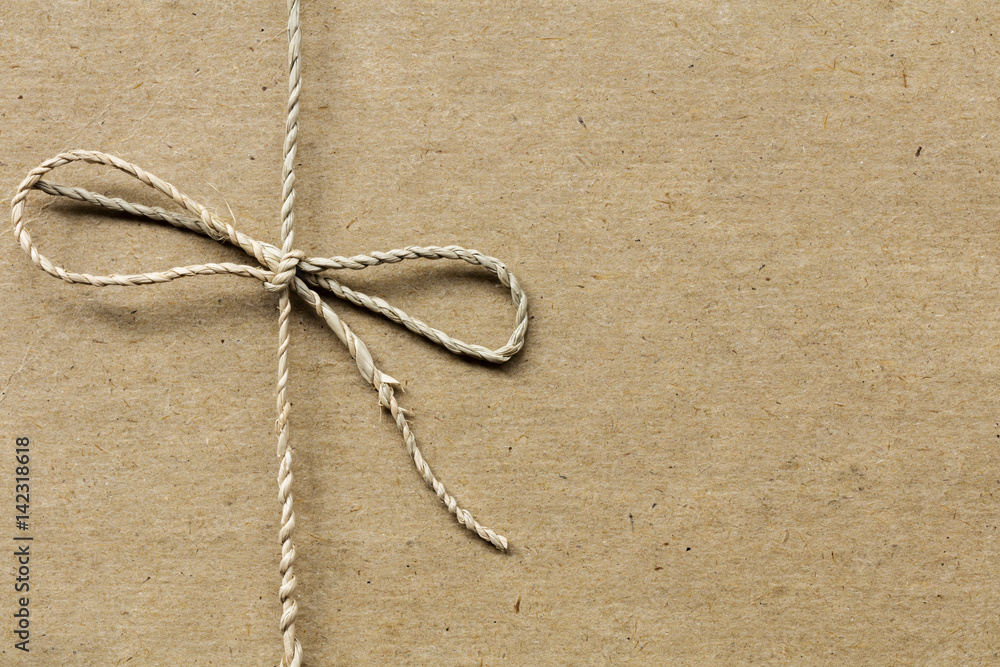 String Tied on Recycled Paper Stock Photo | Adobe Stock