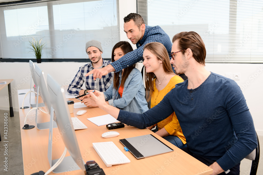 group of five young people student with their teacher in photography ...