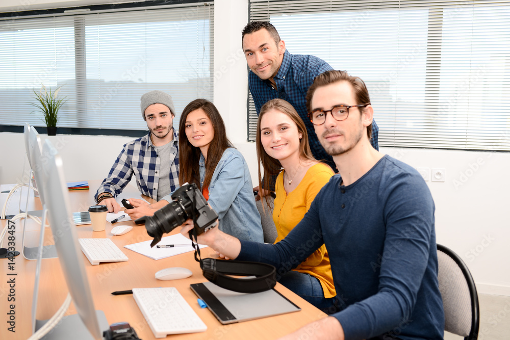 group of five young people student with their teacher in photography ...