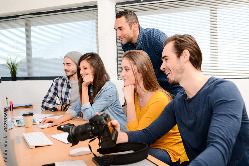 group of five young people student with their teacher in photography ...
