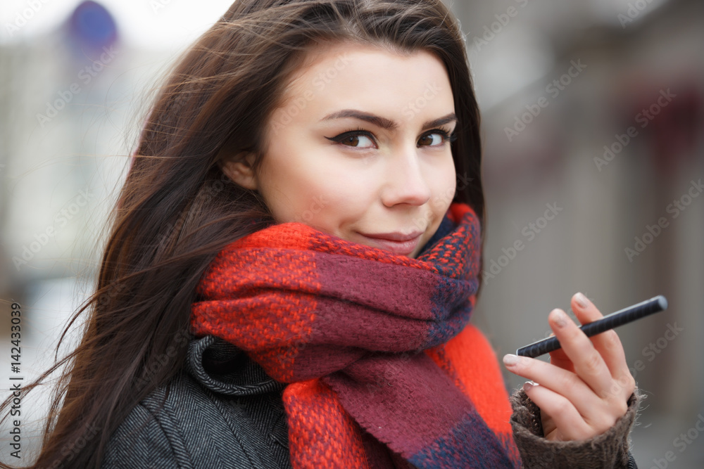 Young girl vaper vaping ecig device Stock Photo | Adobe Stock