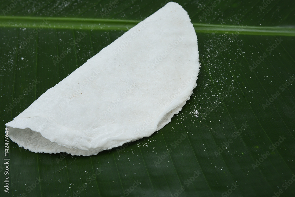 Rice Pathiri flat bread with spicy chicken curry, Kerala India. Popular ...