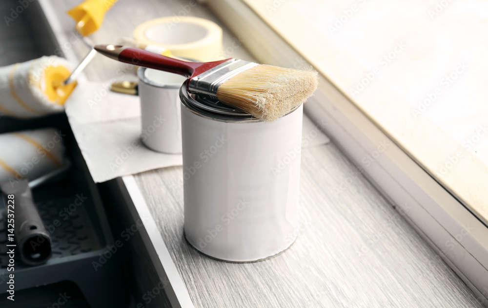 Set of tools for painting on window sill Stock Photo | Adobe Stock