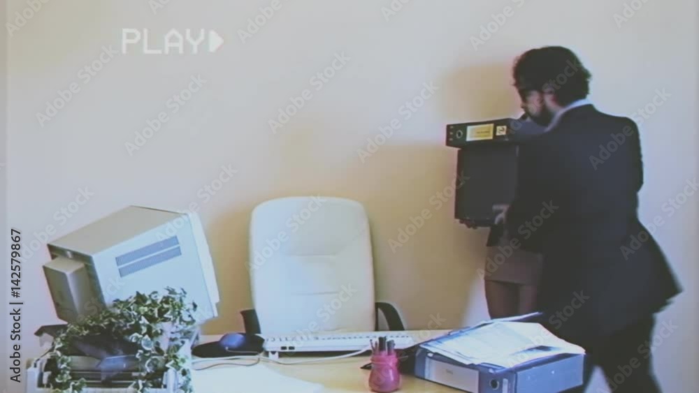 Fake VHS tape: a male employee leaves his workplace when a female ...