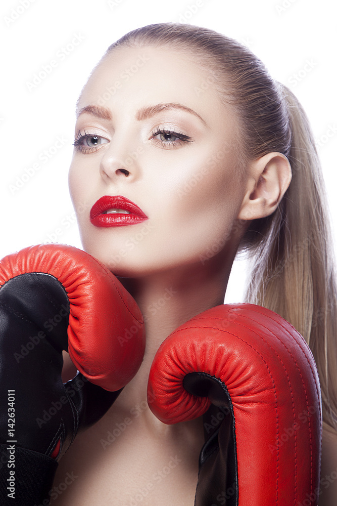 Sporty girl in red fighting gloves isolated on white background Stock ...
