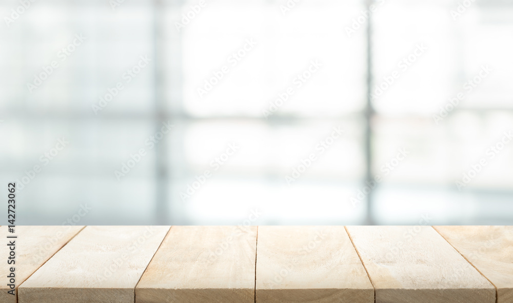 Wood table top on white abstract background.For montage product display ...