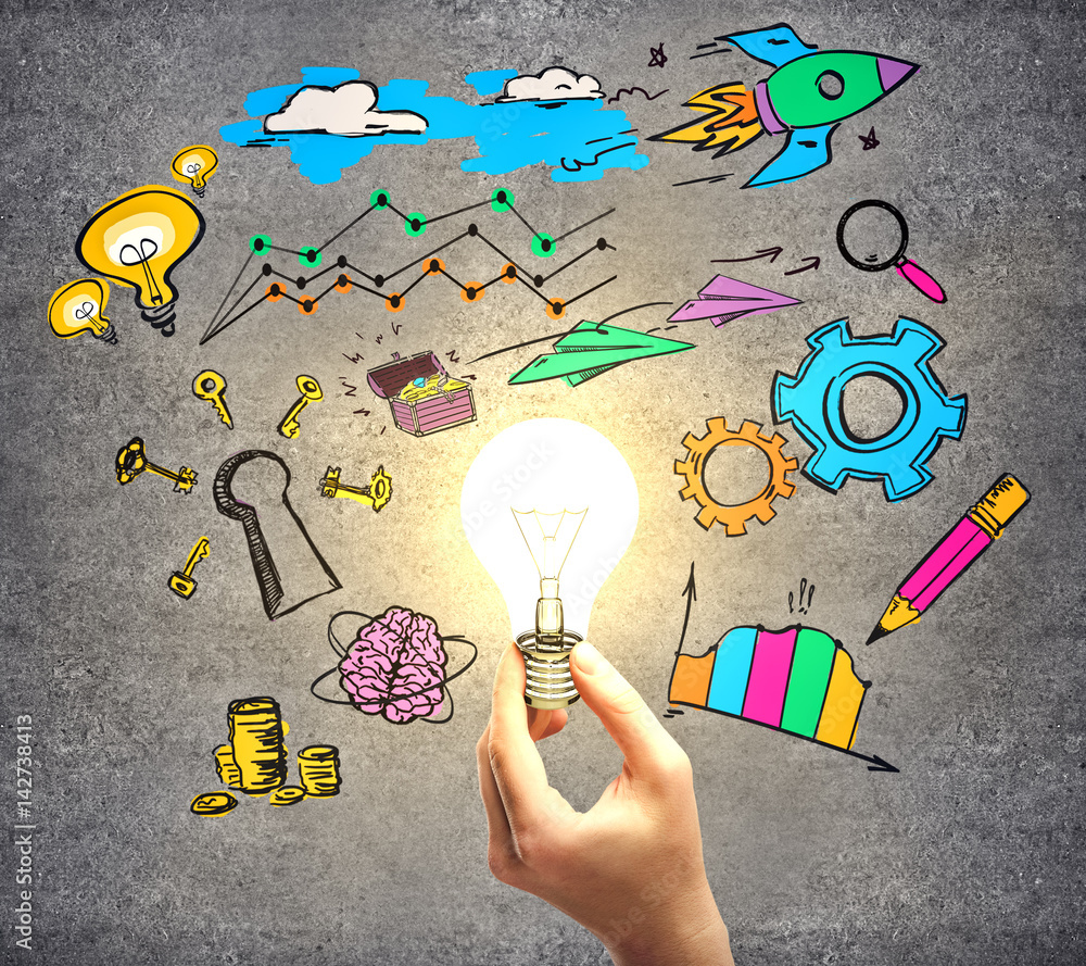 hand holding light bulb Stock Photo | Adobe Stock