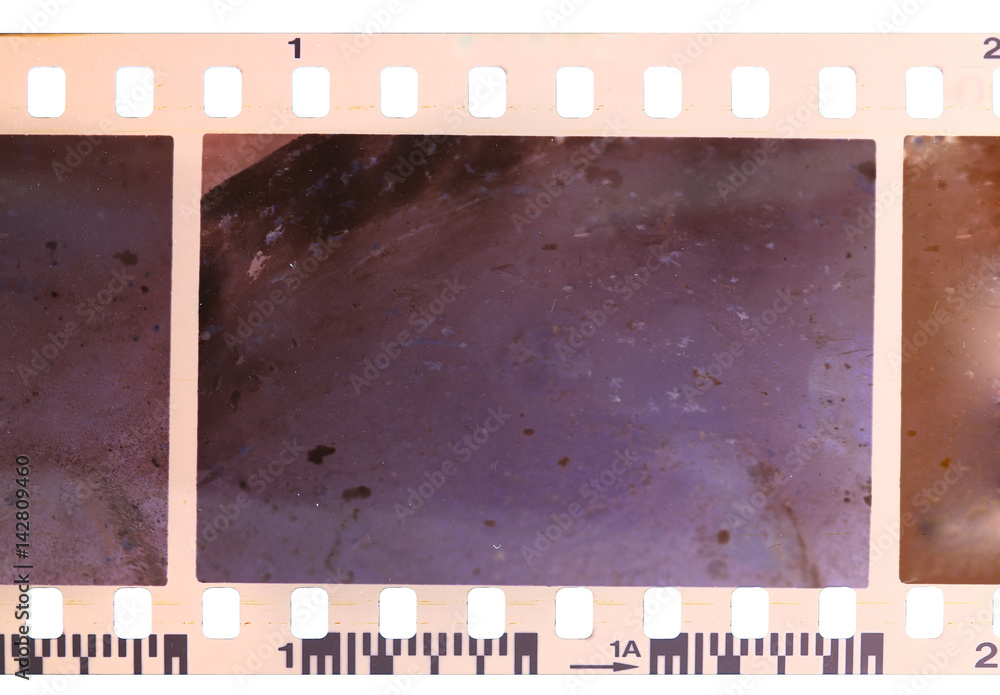 Strip of old, worn and bad developed color celluloid film Stock Photo ...