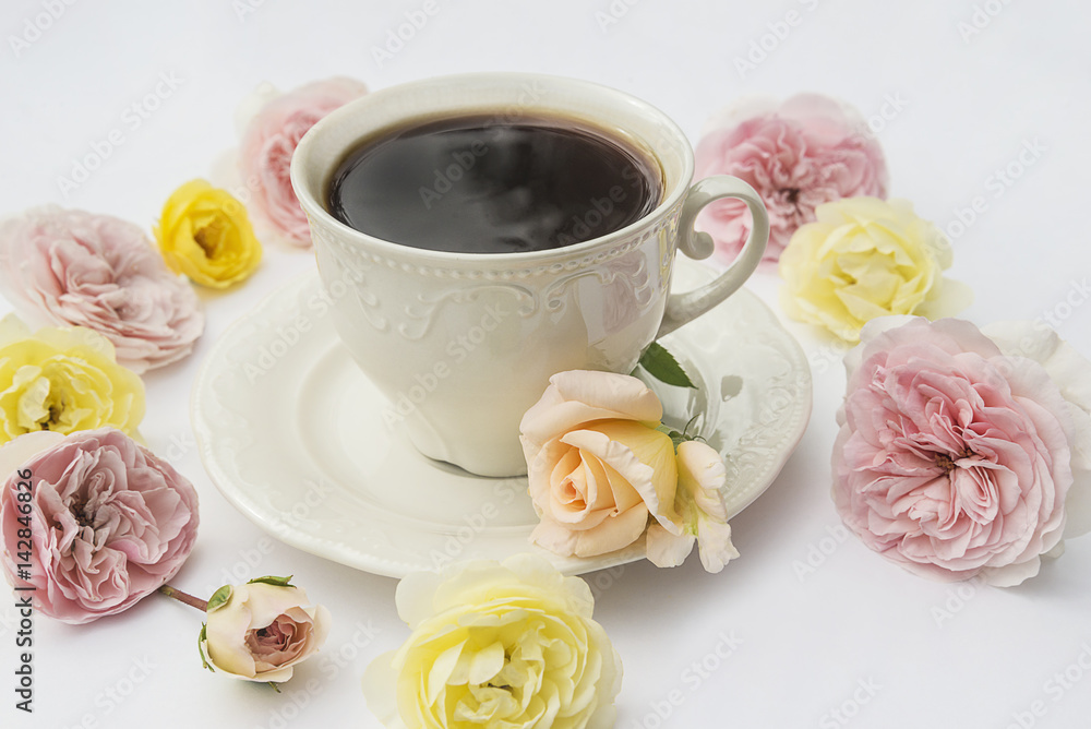 beautiful cup of coffee and rose flowers on a white background Stock ...