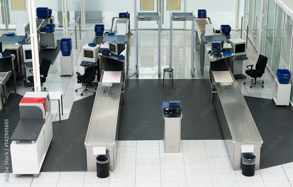 Airport security check in passenger terminal. Stock Photo | Adobe Stock