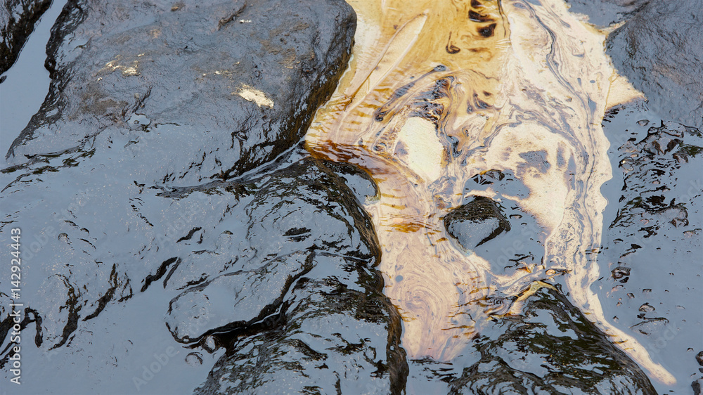 crude oil spill on the stone at the beach in HD ratio, 16x9 Stock Photo ...