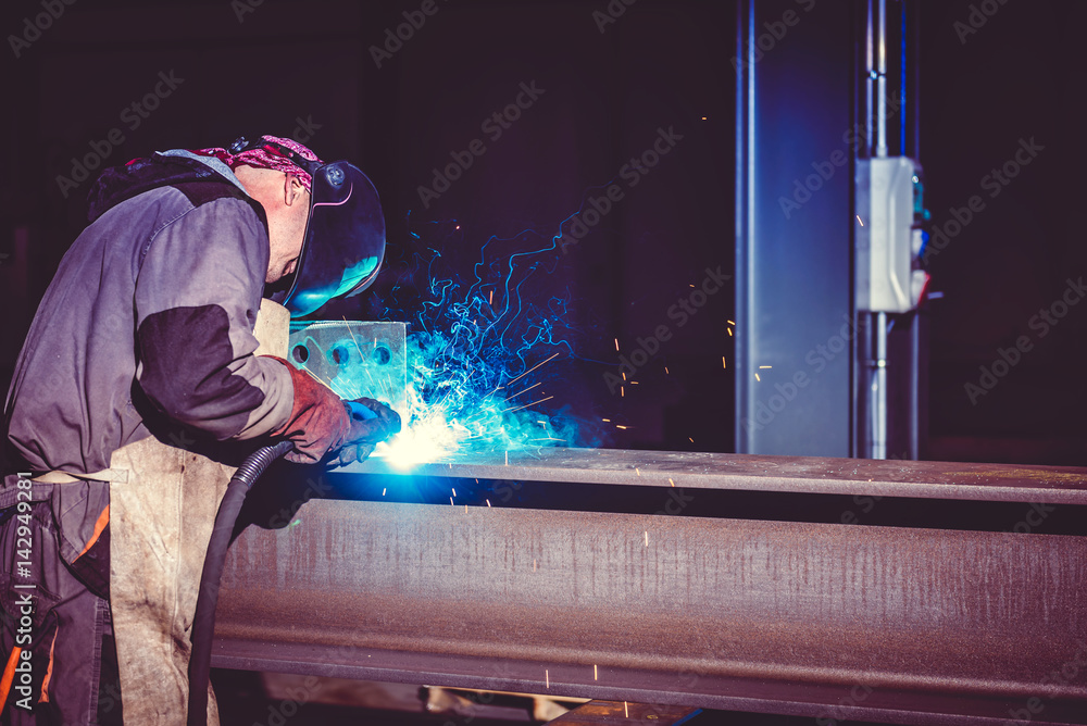 Industrial Welder With Torch Stock Photo | Adobe Stock