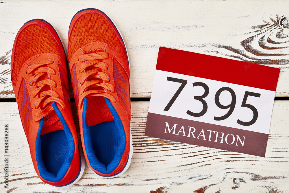 Sneakers and participant number. How to train to marathon. Stock Photo ...