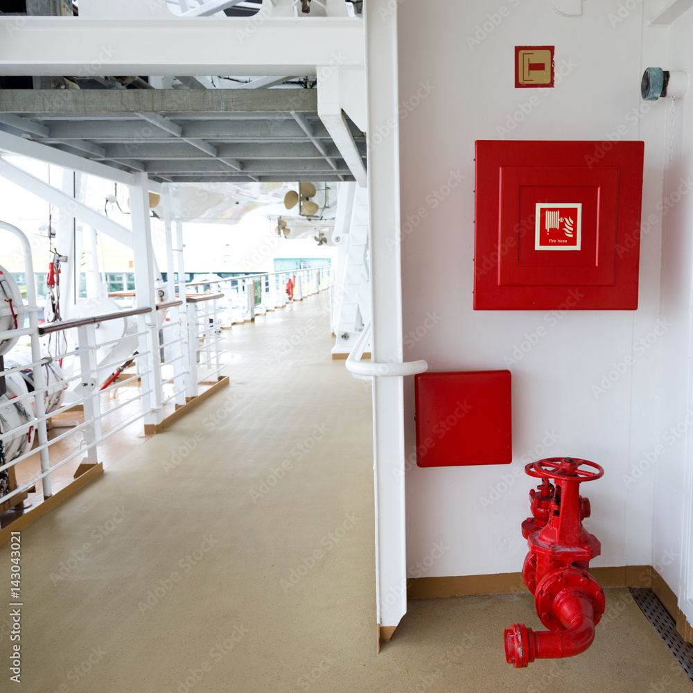 Fire hose cabinet on a ship. Stock Photo | Adobe Stock