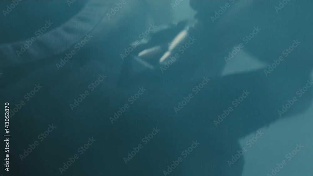 Loading ammo magazine. Close up of hand puts bullet in magazine. Rifle ...