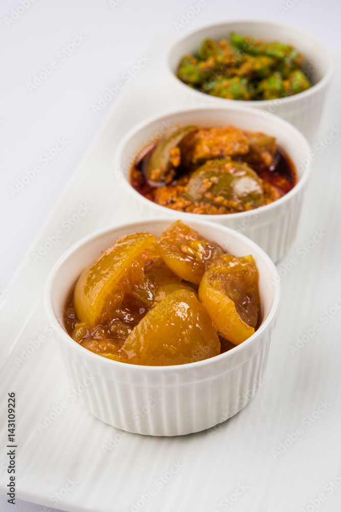 Group photograph of indian pickles like mango pickle , lemon pickle and ...