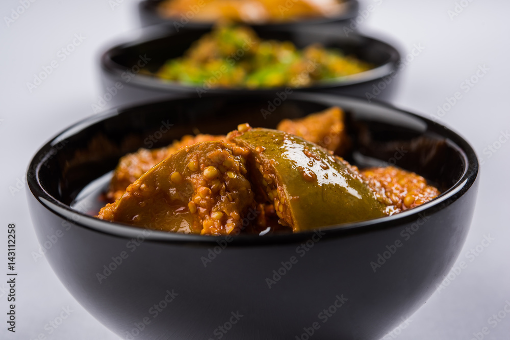 Group photograph of indian pickles like mango pickle , lemon pickle and ...