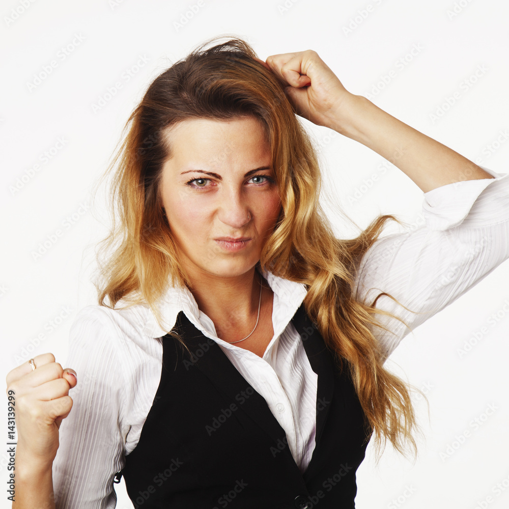 I'm very angry!!! Nervous businesswoman standing clenching his fists ...