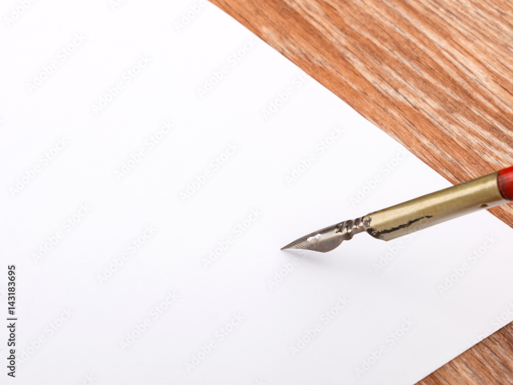 old calligraphy pen on white paper background Stock Photo | Adobe Stock