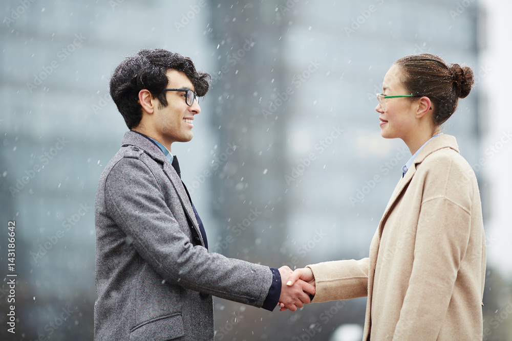 2 People Greeting Each Other