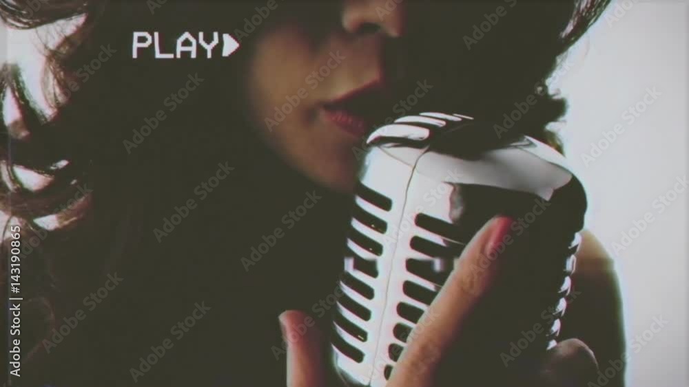 Fake VHS tape: a magnificent woman singing on stage with a retro ...