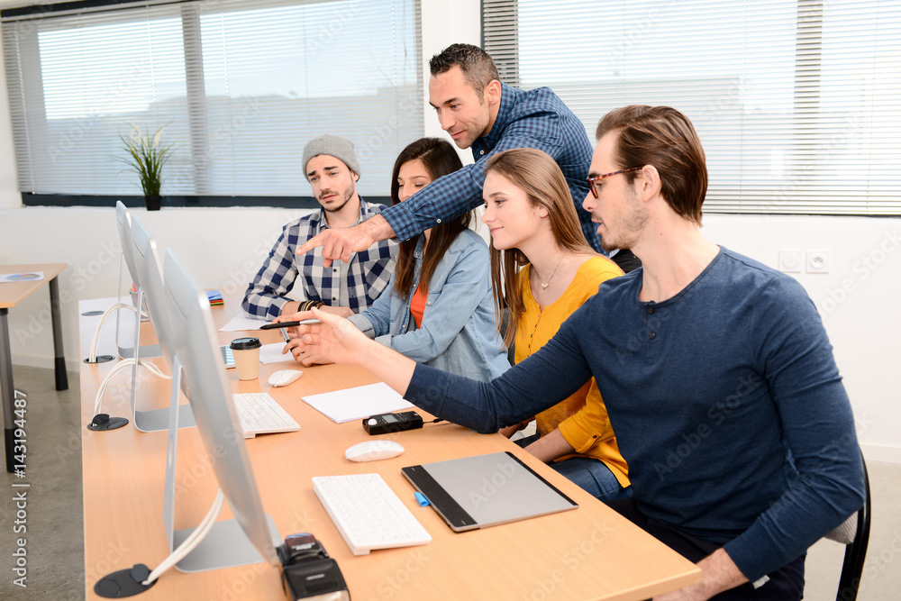 group of five young people student with their teacher in photography ...
