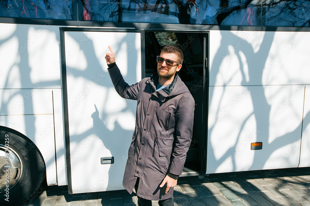 Close up portrait man standing next to the bus.fashion,casual style ...