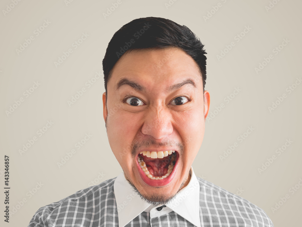 Close up of headshot of mad face man. Stock Photo | Adobe Stock