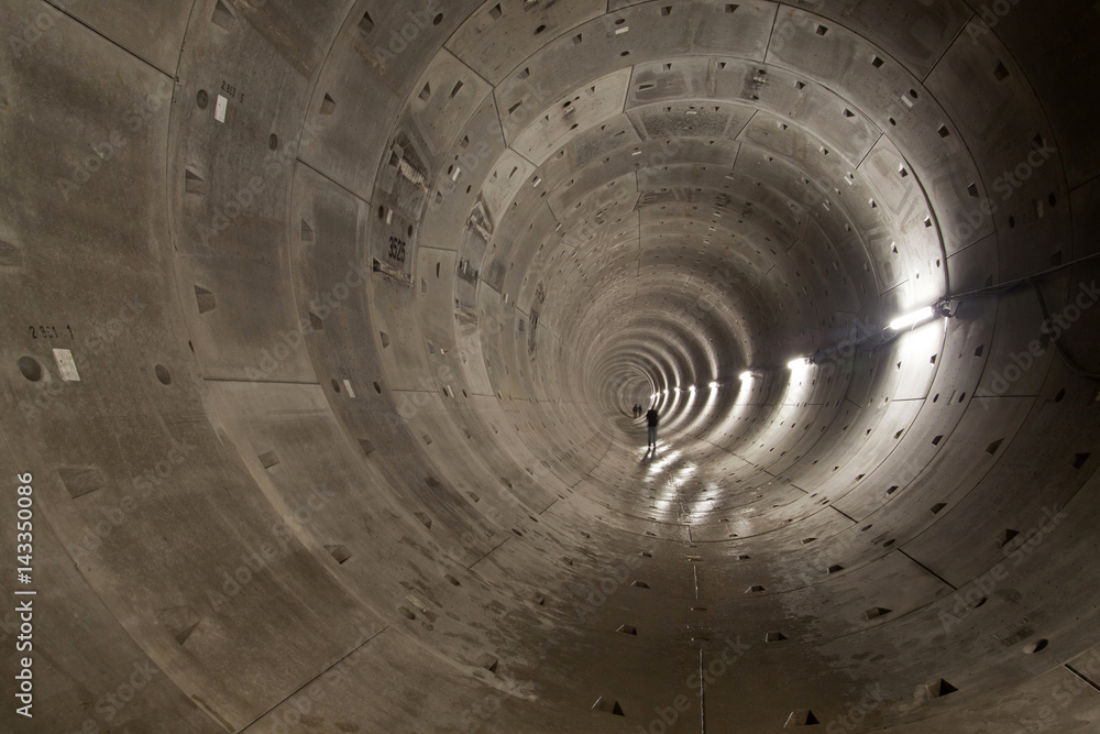 Round concrete elements of a built subway tunnel under construction ...