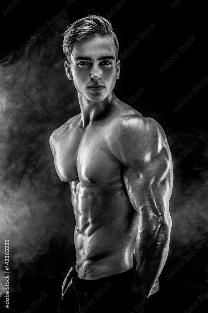 Strong Man Bodybuilder with Six Pack and perfect abs, shoulders, biceps ...