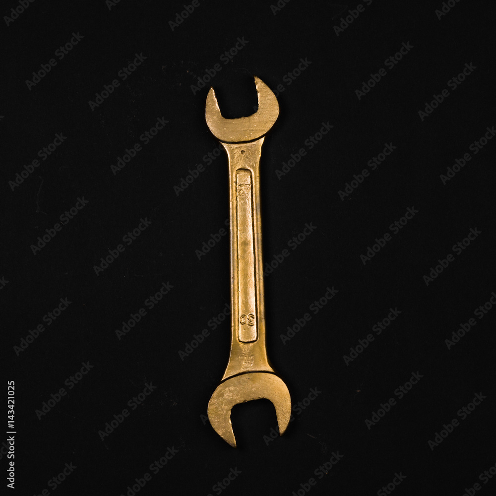 Letter I. Alphabet made of golden repair tools Stock Photo | Adobe Stock