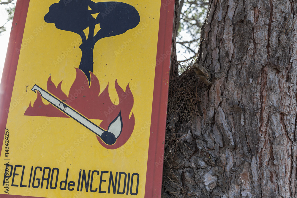 Sign in spanish language, peligro de incendio,fire danger. Outdoor ...