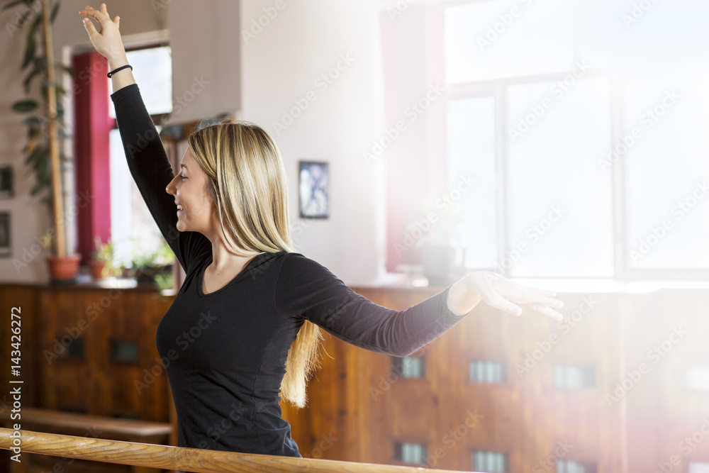 Cute blonde girl on a training. Ballet dancer. Young ballerina ...