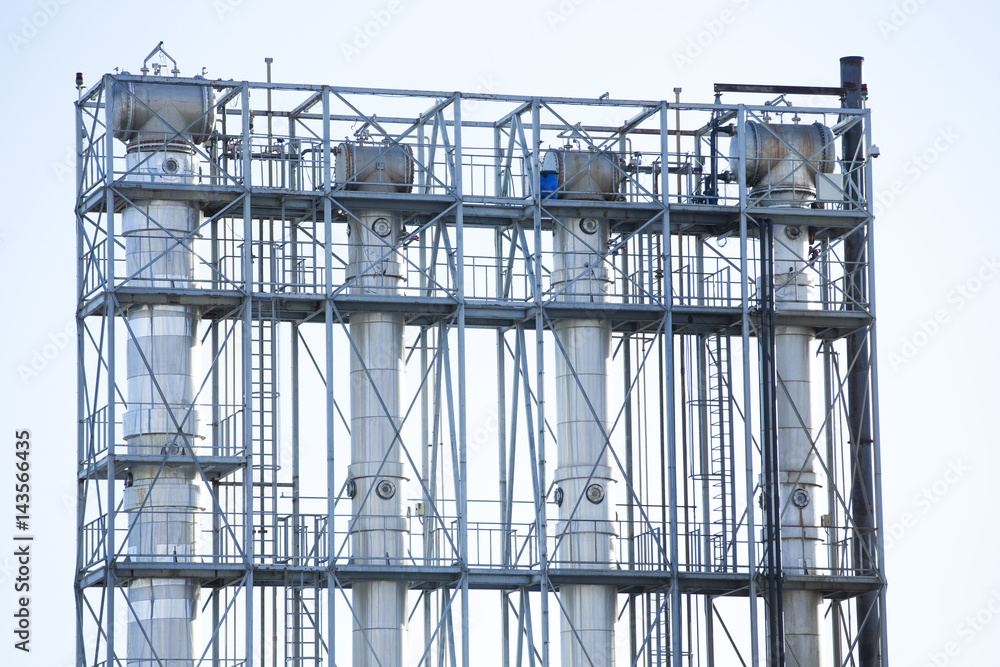 Overall view of an oil and gas refinery, pipelines and towers, heavy ...