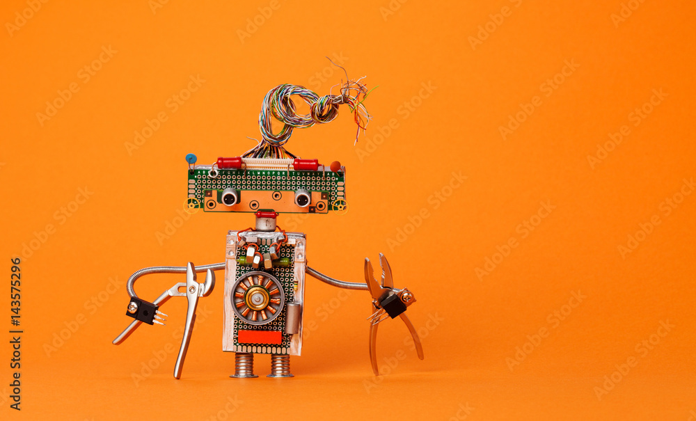 Funny robot electrician with pliers. Creative design robotic toy with ...