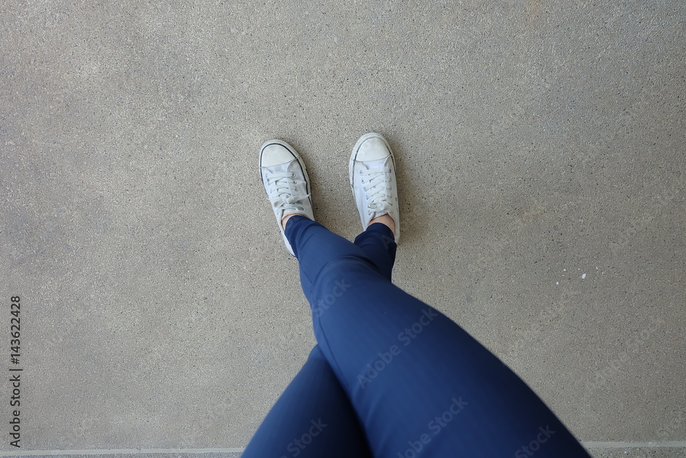 Feet From Above Concept, Teenage Person in White Sneakers Standing on ...