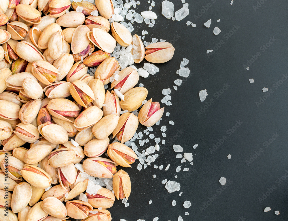 Heap of Inshell Pistachios and Peeled Pistachios with Large Salt ...