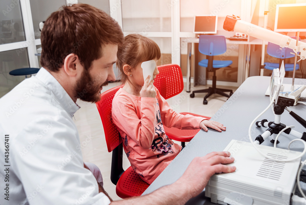 Orthoptics. Pleoptics. Doctor explains how to use ophthalmic equipment ...