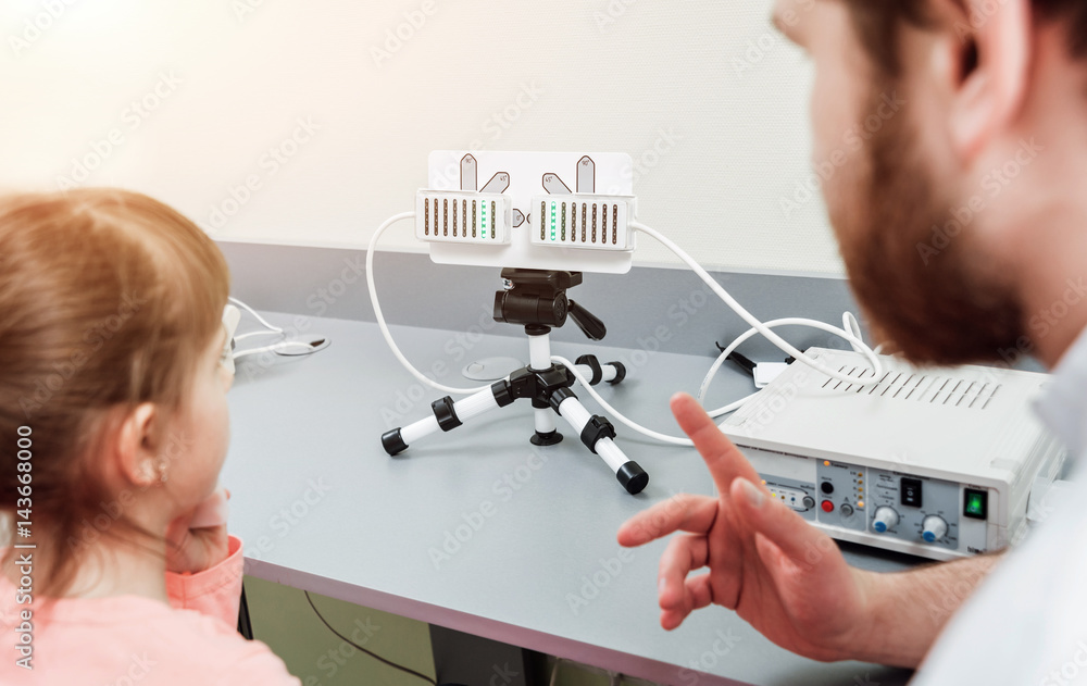 Orthoptics. Pleoptics. Doctor explains how to use ophthalmic equipment ...