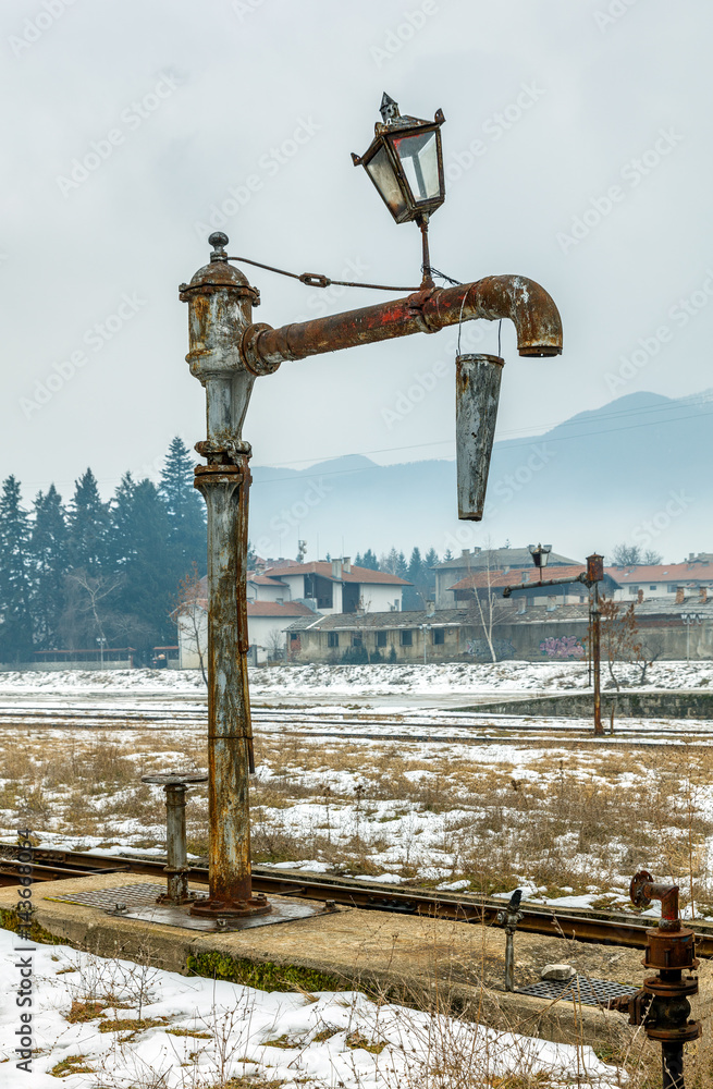 Device for pouring water in the locomotive is standing at the station ...