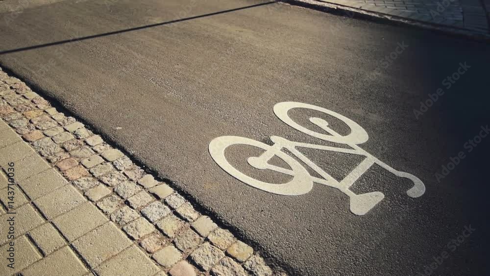 Vidéo Stock Bicycle ride on urban lane in sunset, shadow of ...