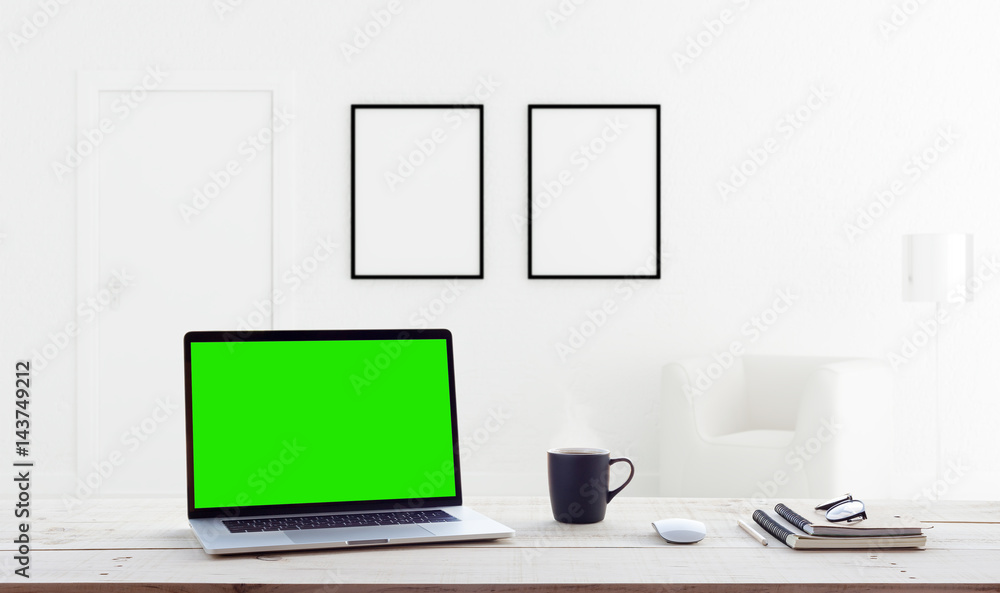 laptop computer showing green screen in home interior background Stock ...
