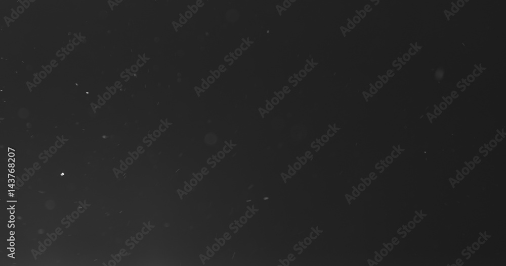 dust particles fast moving over black background from left, 4k photo ...