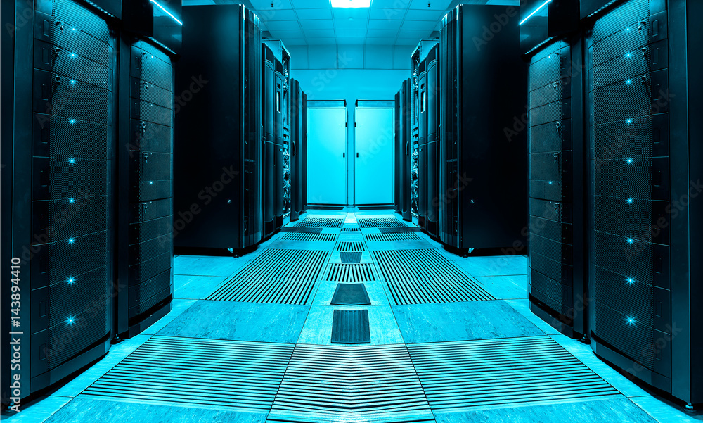 Symmetric Server Room With Rows Of Mainframes In Modern Data Center