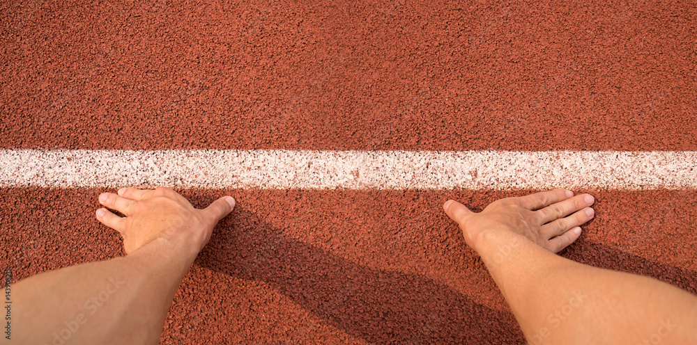 Top view Touch hands to line start for running on Athletics track Stock ...
