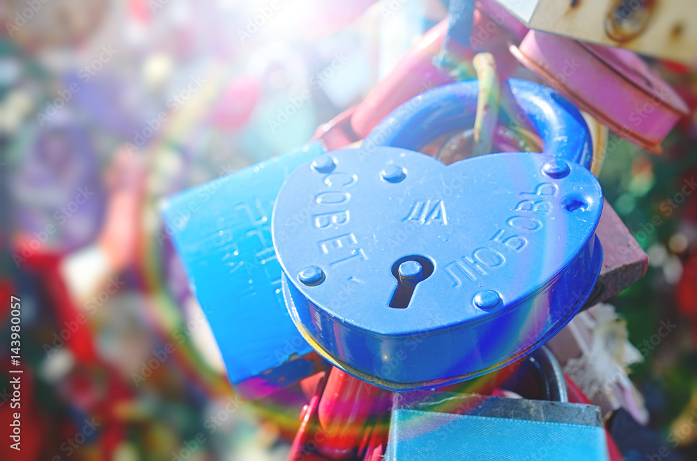 Beautiful multicolored wedding locks on the iron tree of love. Concept ...