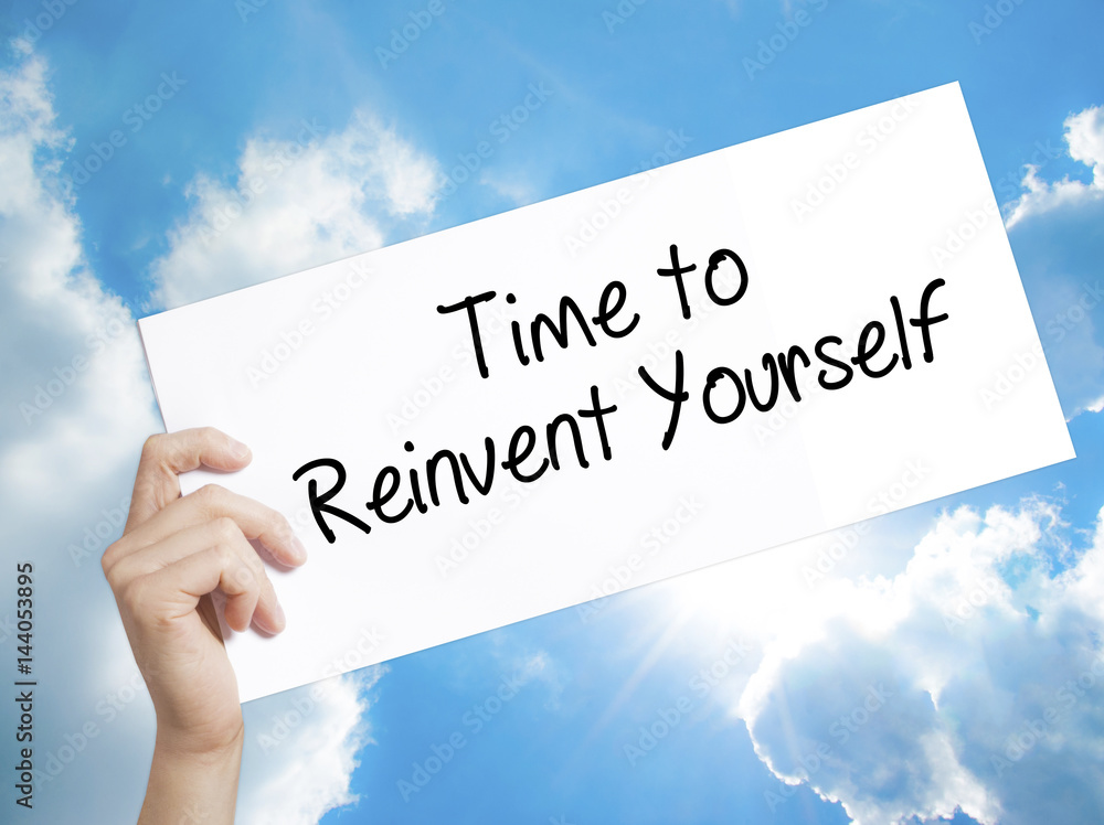 Time to Reinvent Yourself Sign on white paper. Man Hand Holding Paper ...